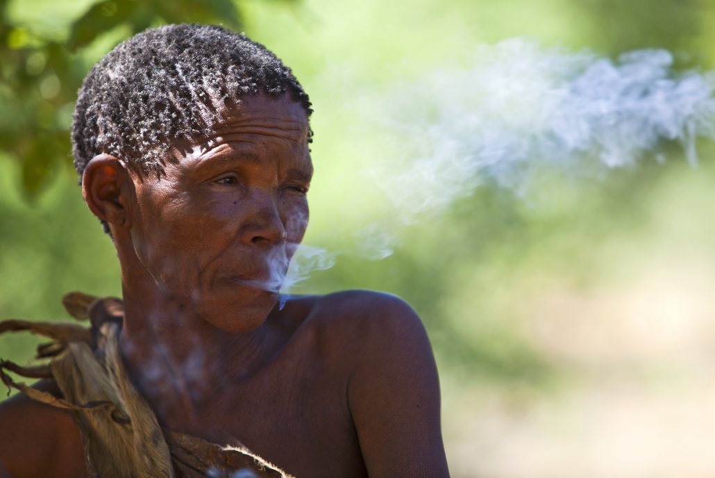 African Tribal Woman Smoking